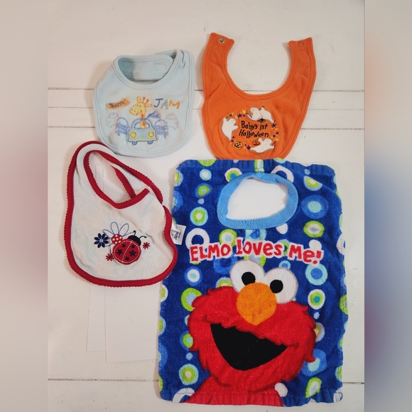 Unknown | Other | 4 Vintage Baby Bibs Elmo Halloween Giraffe Ladybug ...